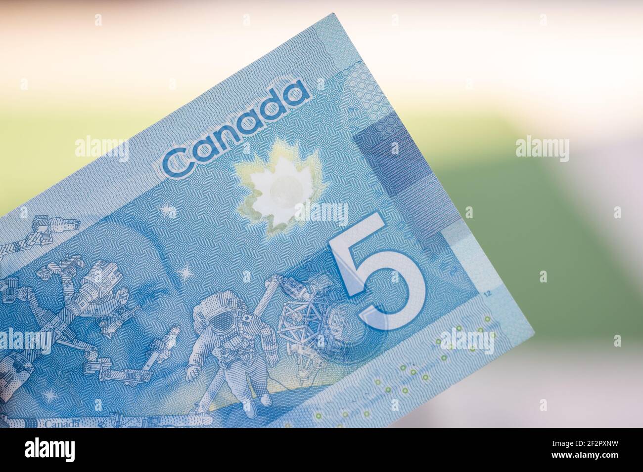 Five canadian dollar bill hi-res stock photography and images - Alamy