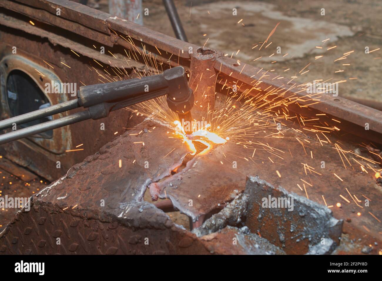 Sparkle from Oxygen Acetylene Cutting Torch for Car Body Part or Auto ...