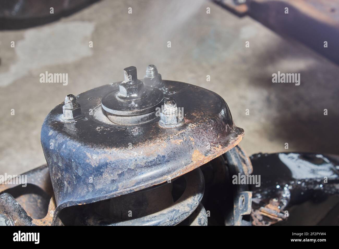 Zoom View of Spray Paint Upper Shock Absorber Frame for Rust Protection ...