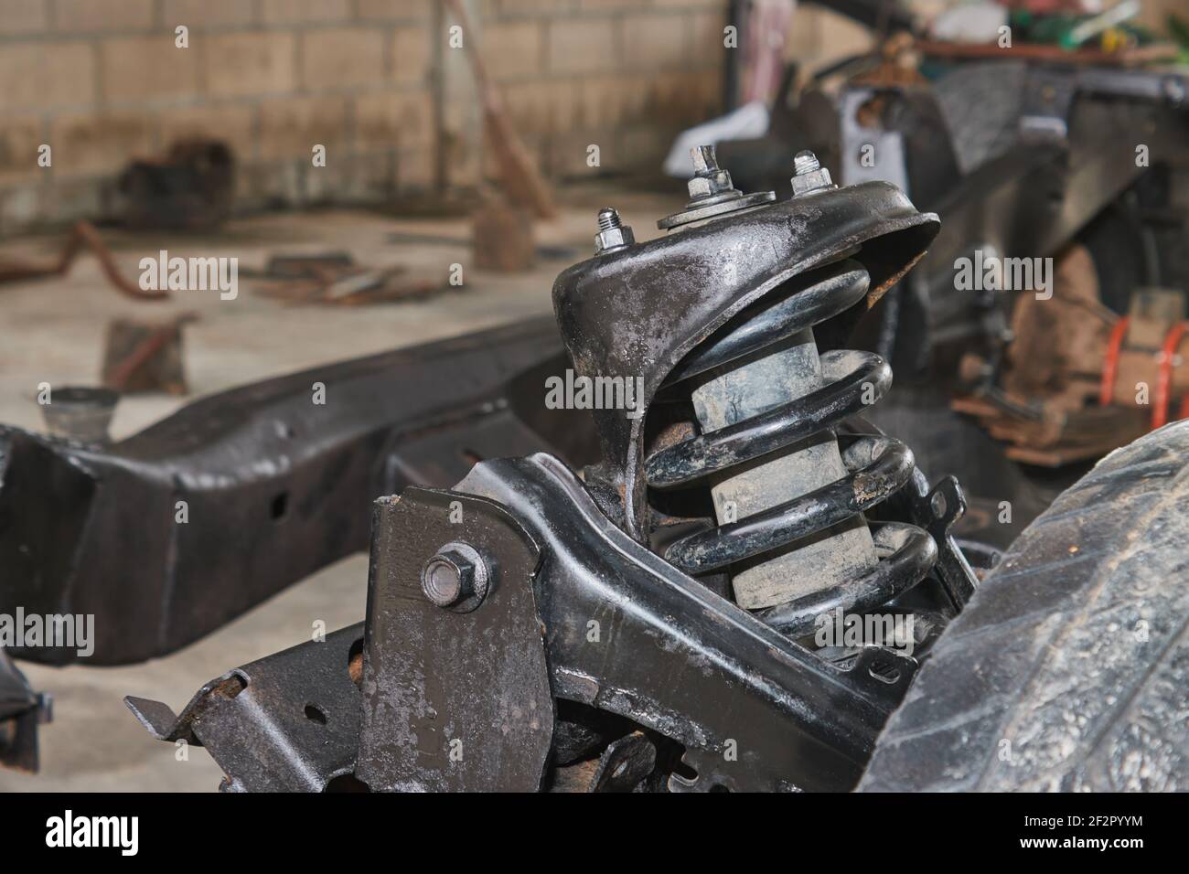 Back View Shock Absorber and Coil Spring and Upper Arm Ball Joint and ...