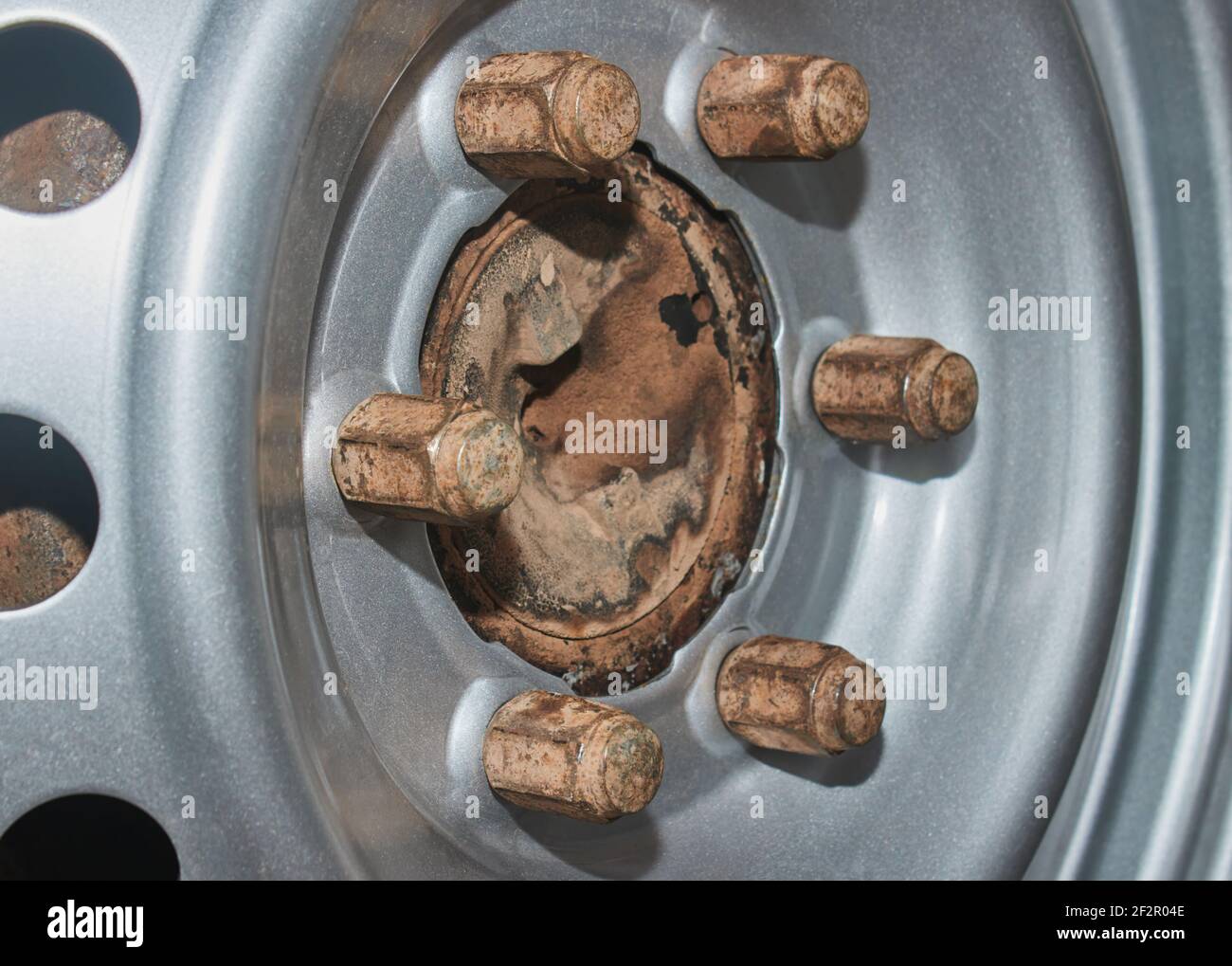 Six Car Wheel Nut on Wheel Hub and Wheel Rim on Center Frame Stock ...