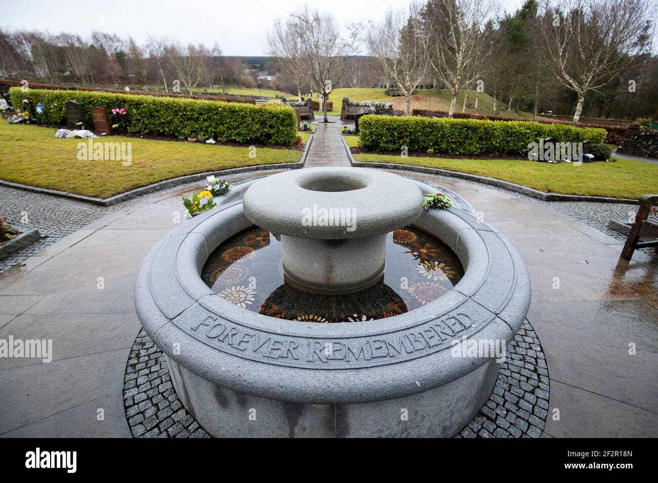 The memorial fountain at the Garden of Remembrance at Dunblane Cemetery ...