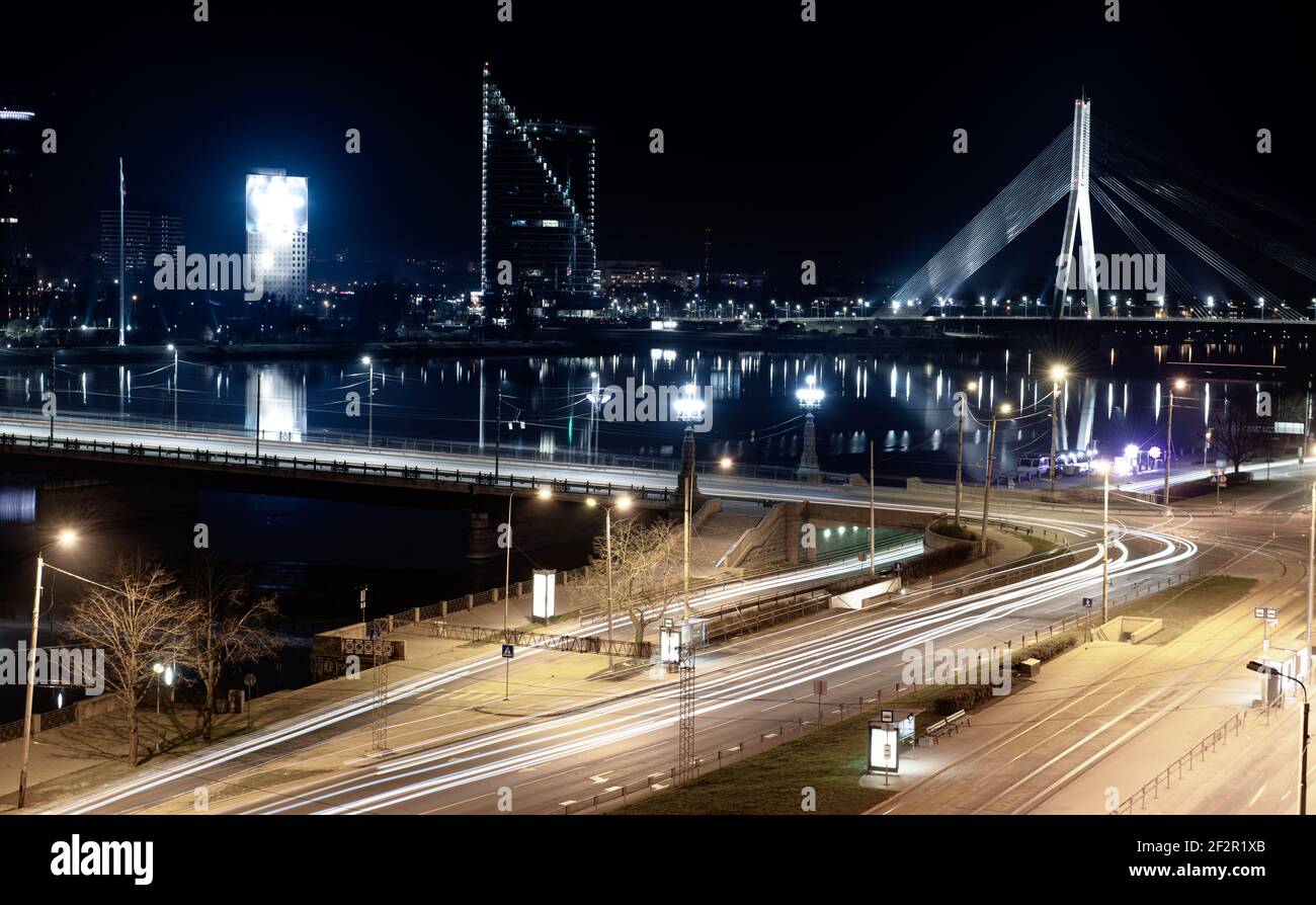 Night view of the bridge over the Daugava river. Riga, Latvia Stock ...