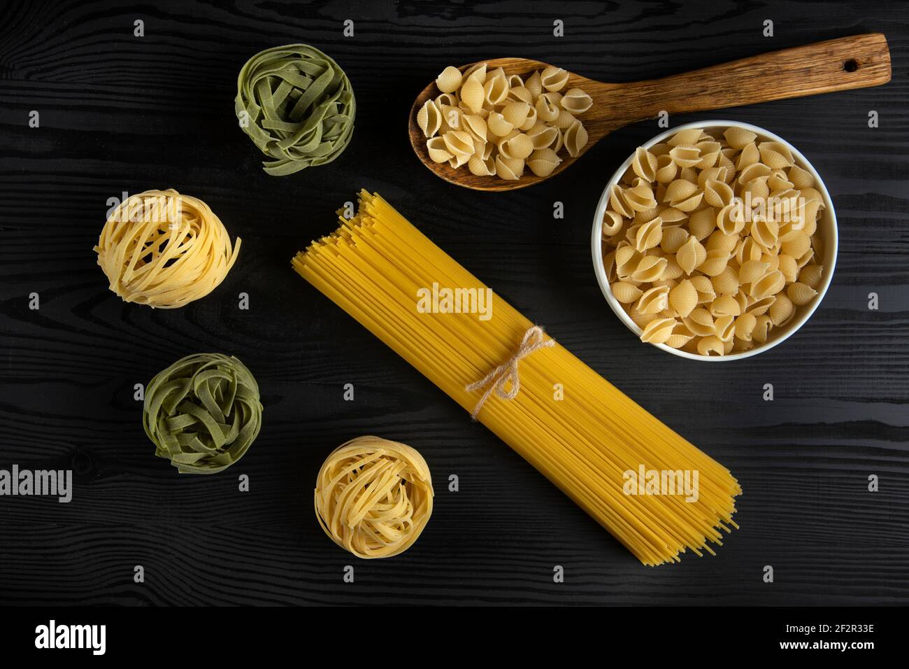 Pasta varieties served on the rustic table Stock Photo - Alamy