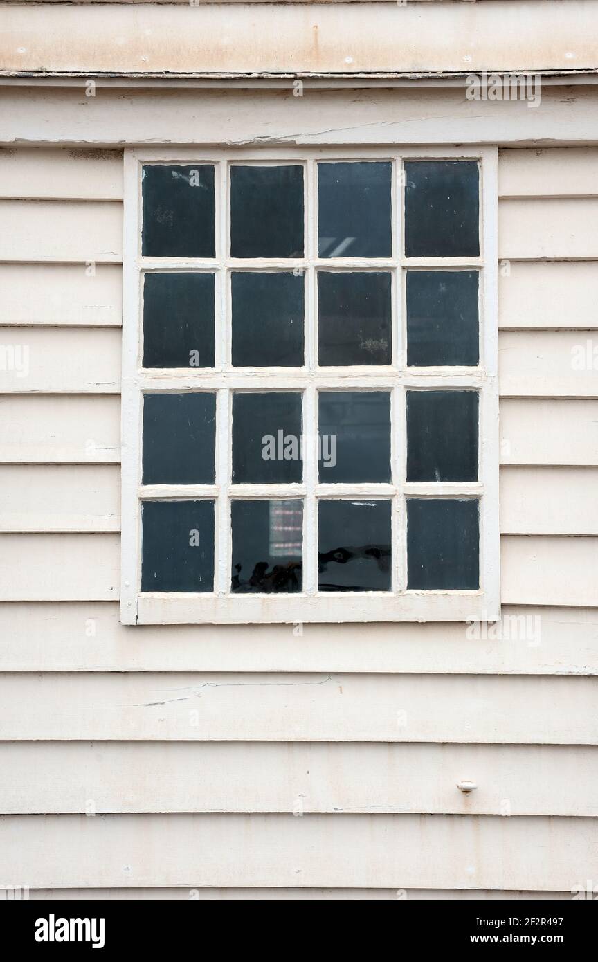 Exterior view of window in white clapboard building Stock Photo - Alamy