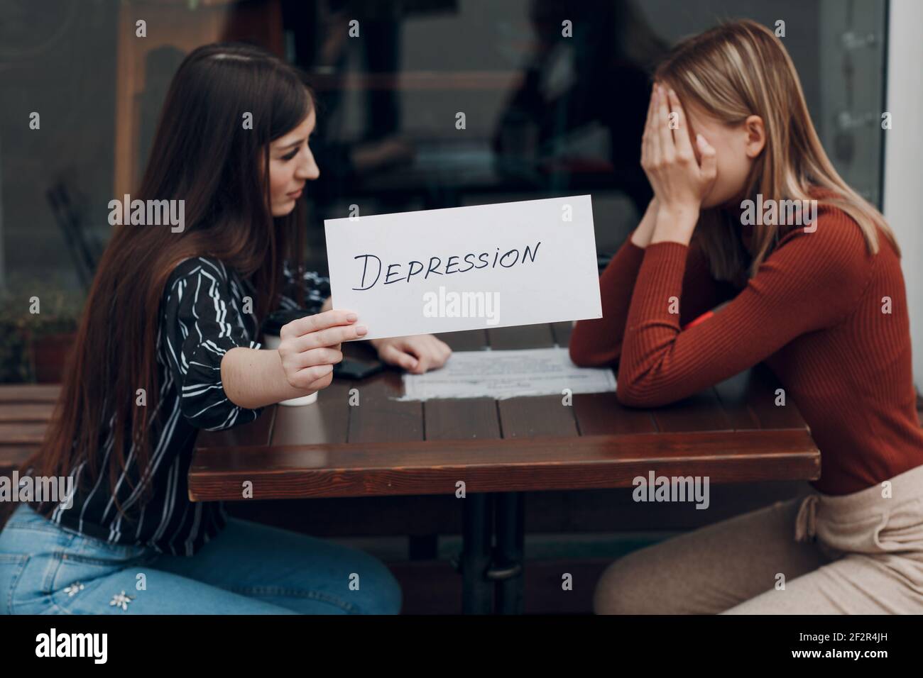 Two people talking sad and happy hi-res stock photography and images ...