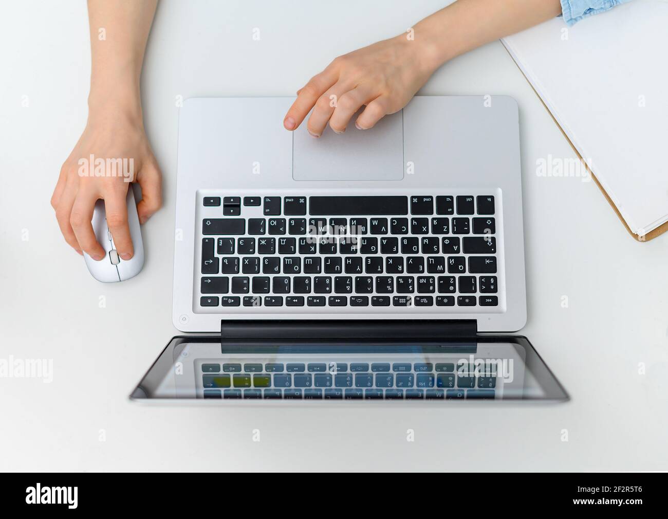 Workspace with hands typing on laptop. Flat lay, top view Stock Photo ...