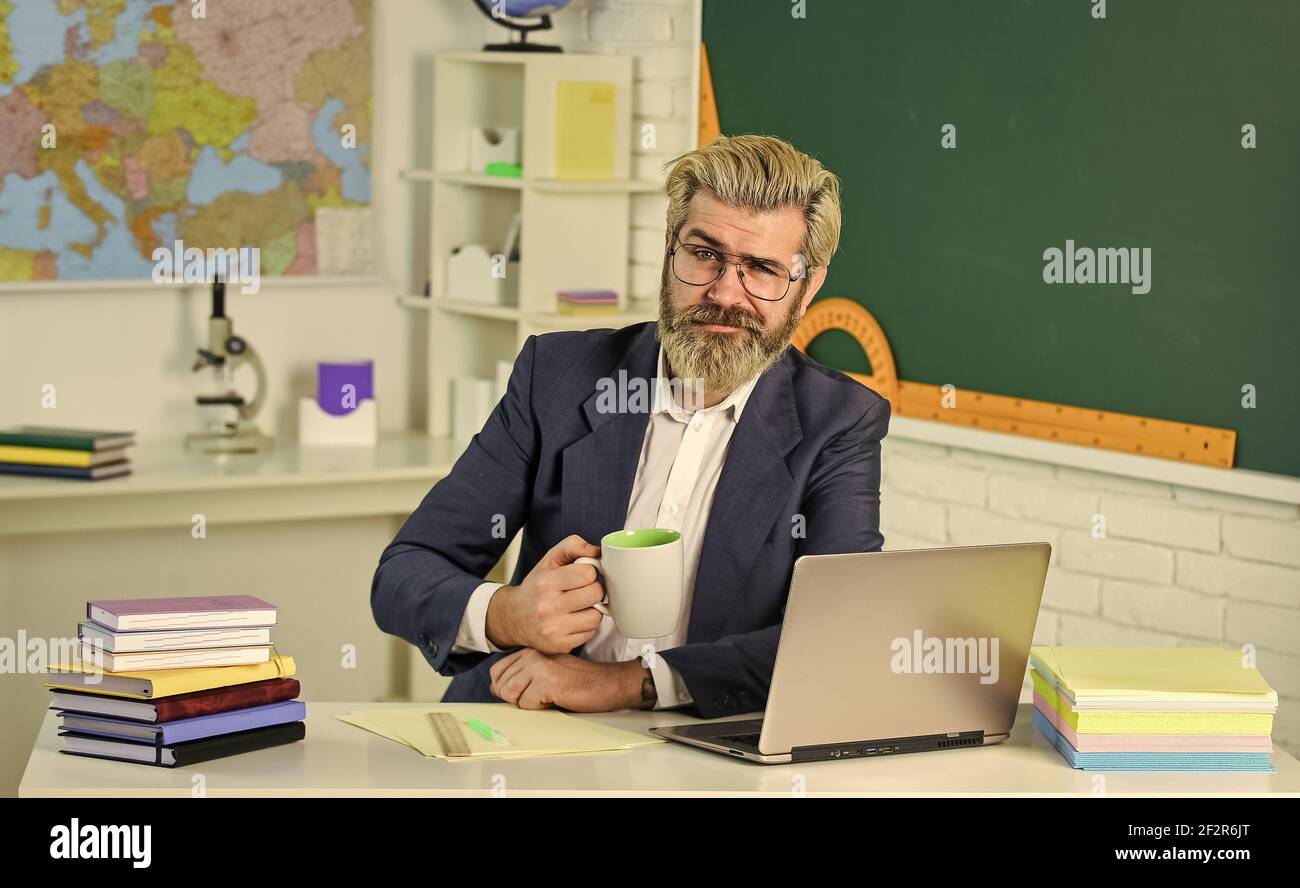 More coffee please. Senior teacher drink coffee. School break. Hot ...