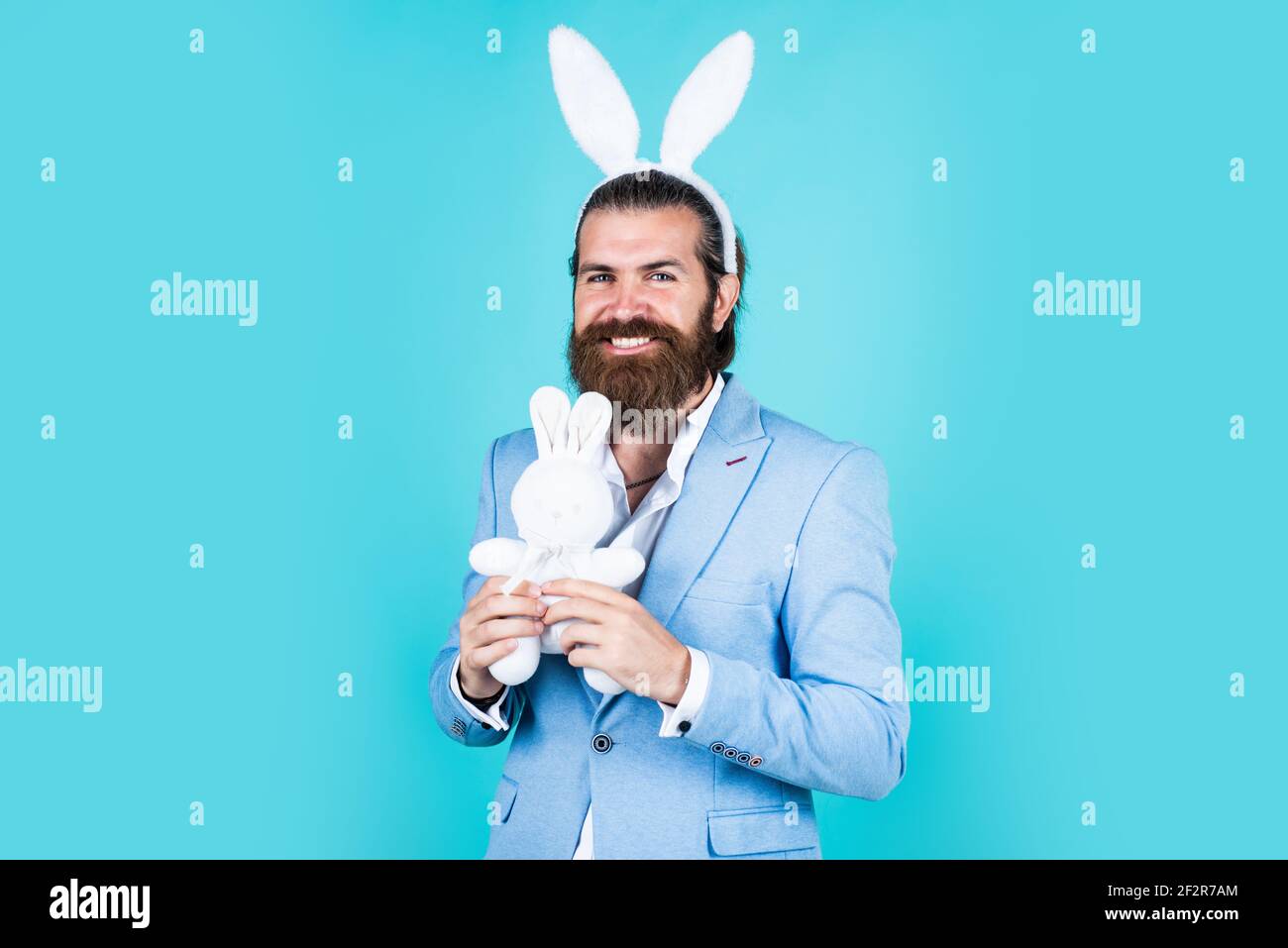 happy easter handsome caucasian businessman with trendy hairstyle in ...