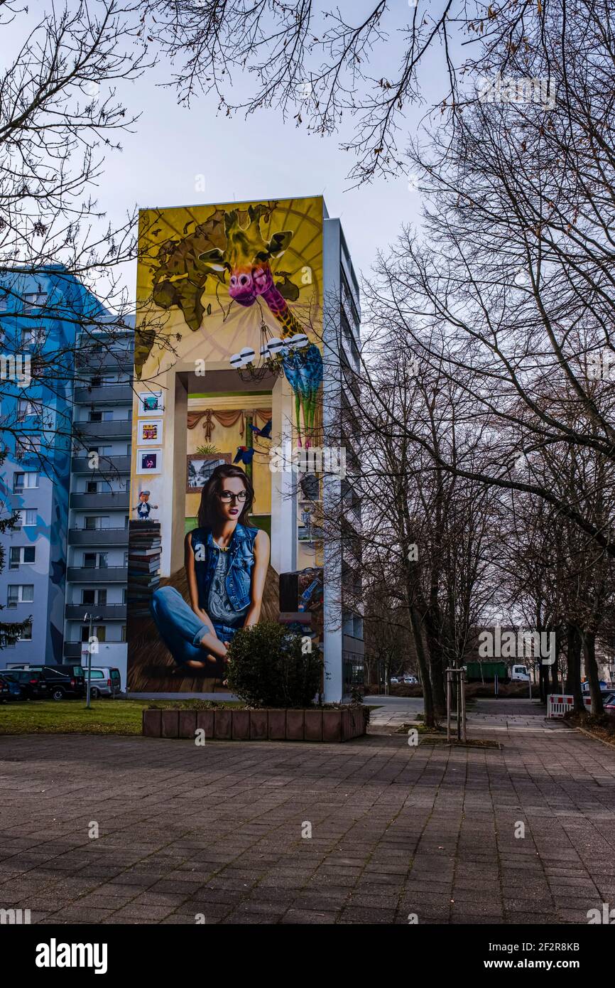 Colorfully painted facade of a high-rise building in the center of town ...