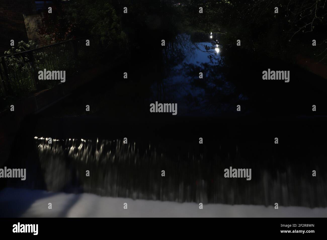 Night sky and garden lit up with halogen and solar lights Stock Photo ...