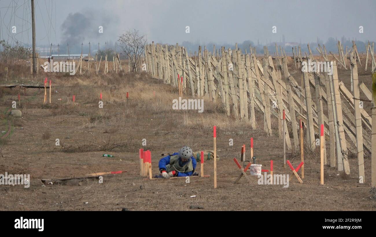 A sapper of the Azerbaijan National Agency for Mine Action (ANAMA ...