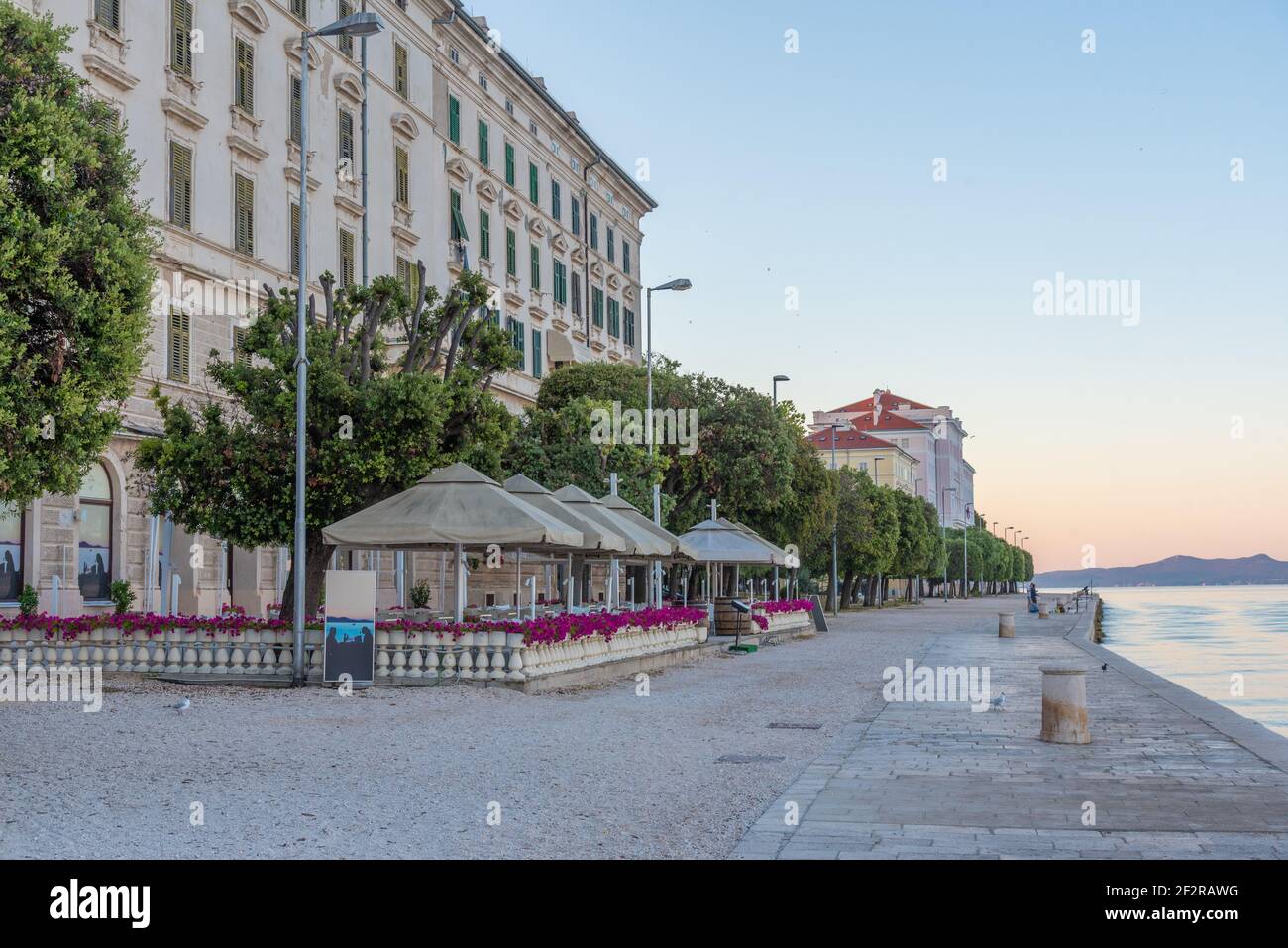 Sunrise view of Riva promenade in the historical part of Croatian city ...
