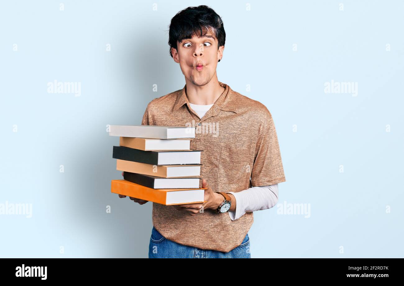 Boy squinting book hi-res stock photography and images - Alamy