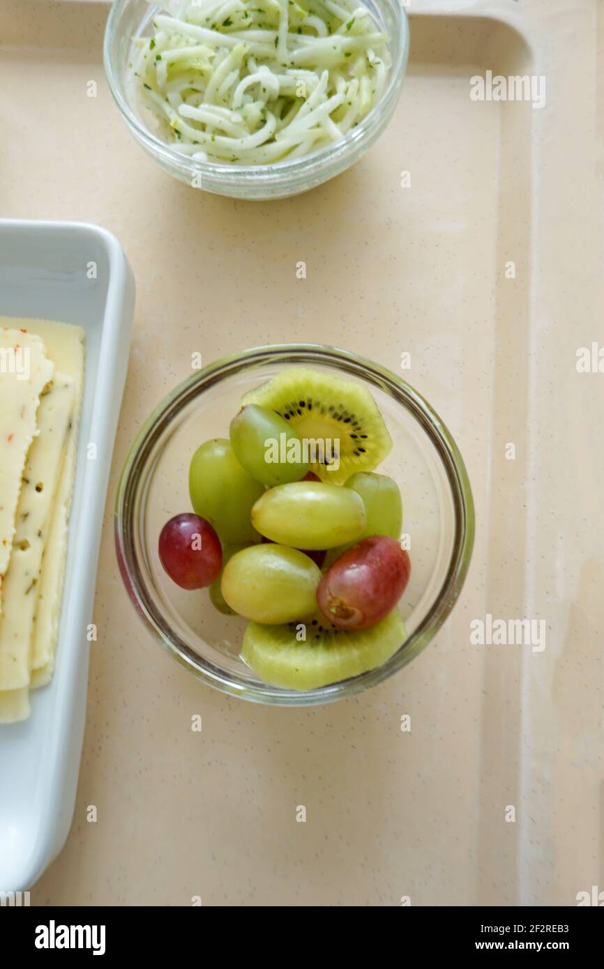 Fresh fruit in the hospital photographed on the tray with natural light ...