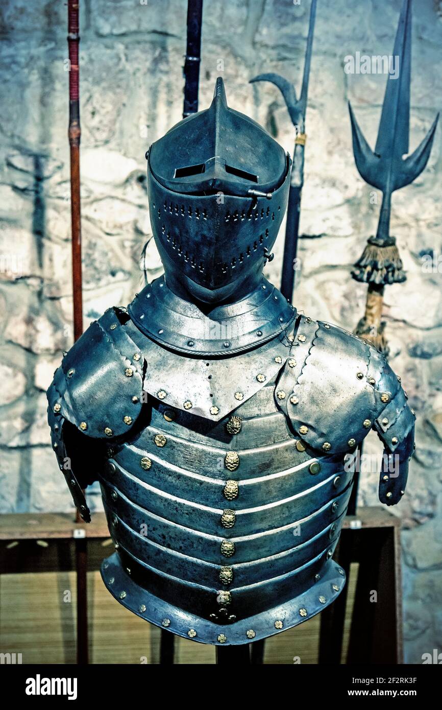 Gallery of knight's armor. Knight's iron armor in the museum. toned ...