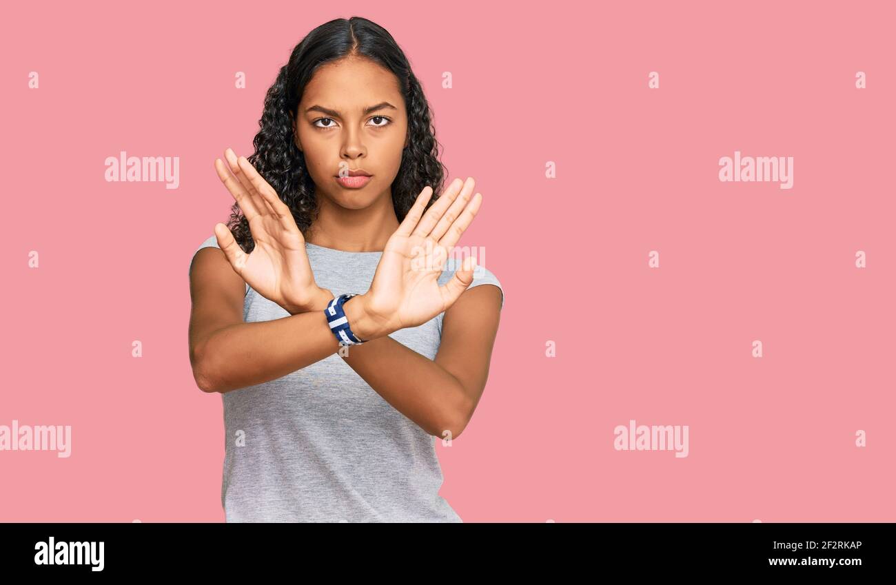 Young african american girl wearing casual clothes rejection expression ...