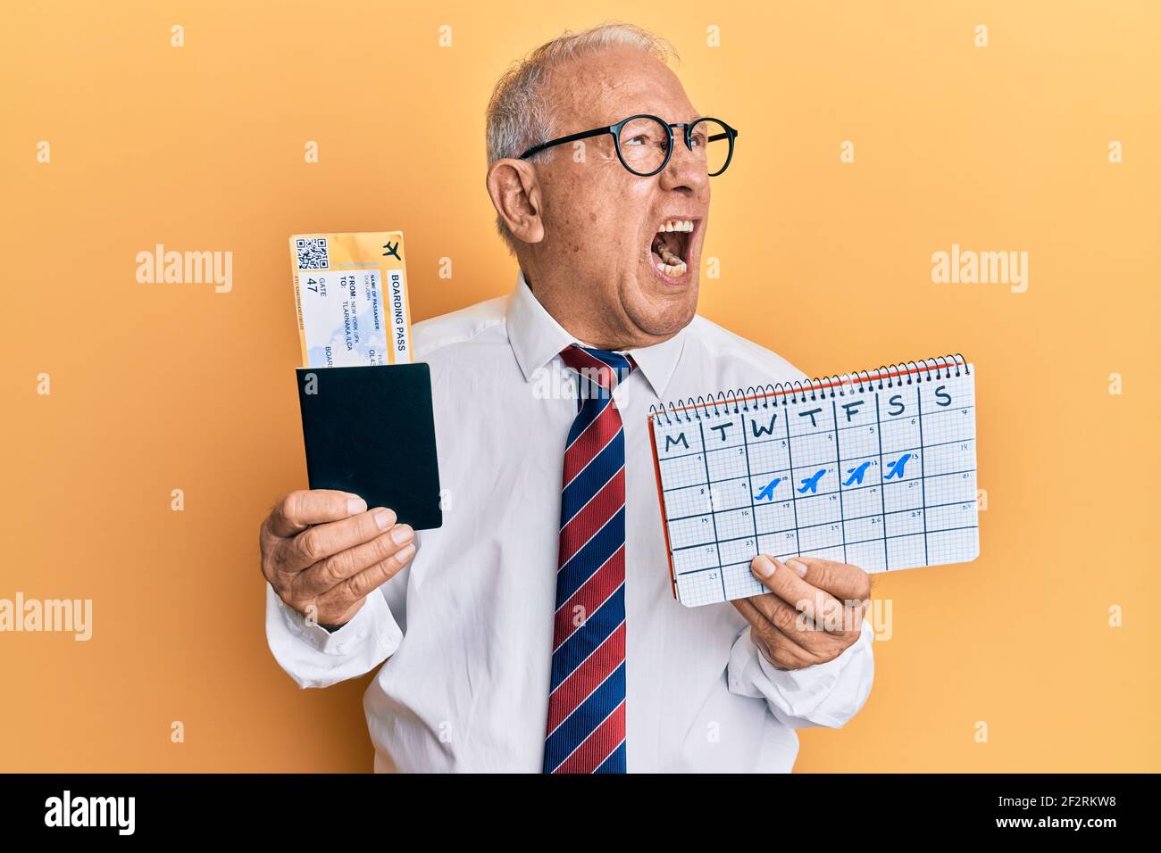 Senior caucasian man going on business trip holding boarding pass angry ...