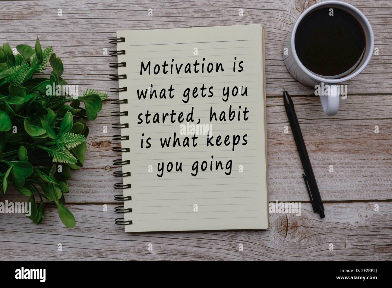 Motivational and inspirational quote on notepad on wooden desk Stock ...