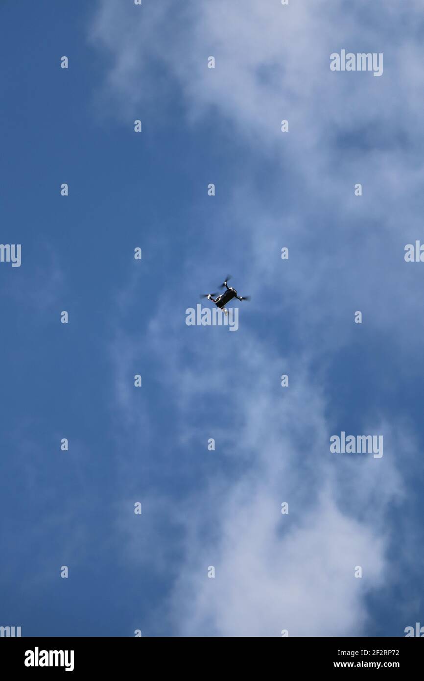 Drone circling through the clear blue Tenerife skies Stock Photo - Alamy