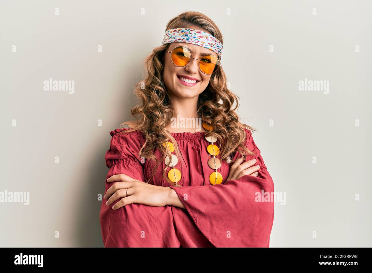 Young blonde girl wearing bohemian and hippie style happy face smiling ...