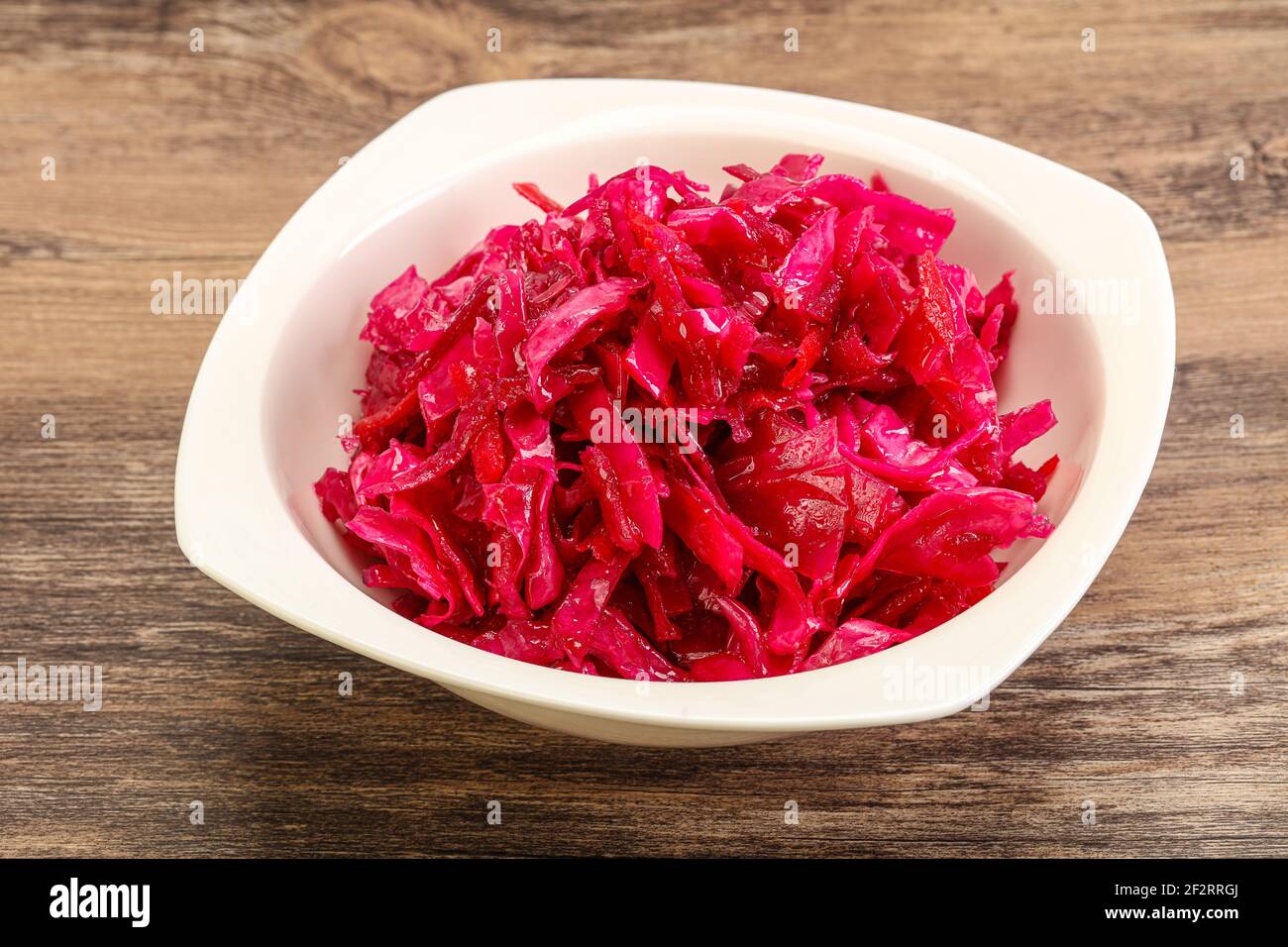 Marinated red cabbage with beetroot in the bowl Stock Photo - Alamy