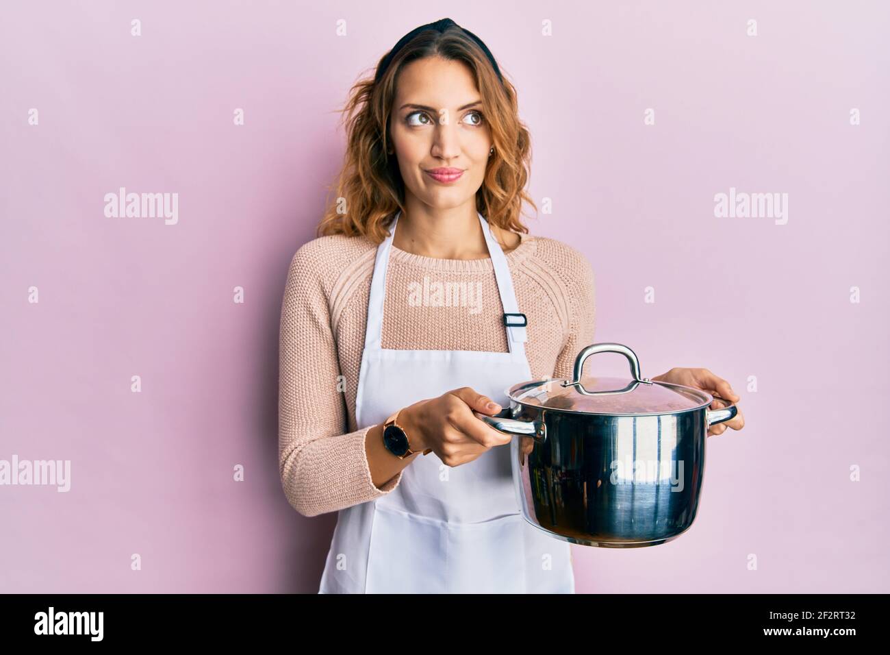 Girl cooking thinking looking up hi-res stock photography and images ...