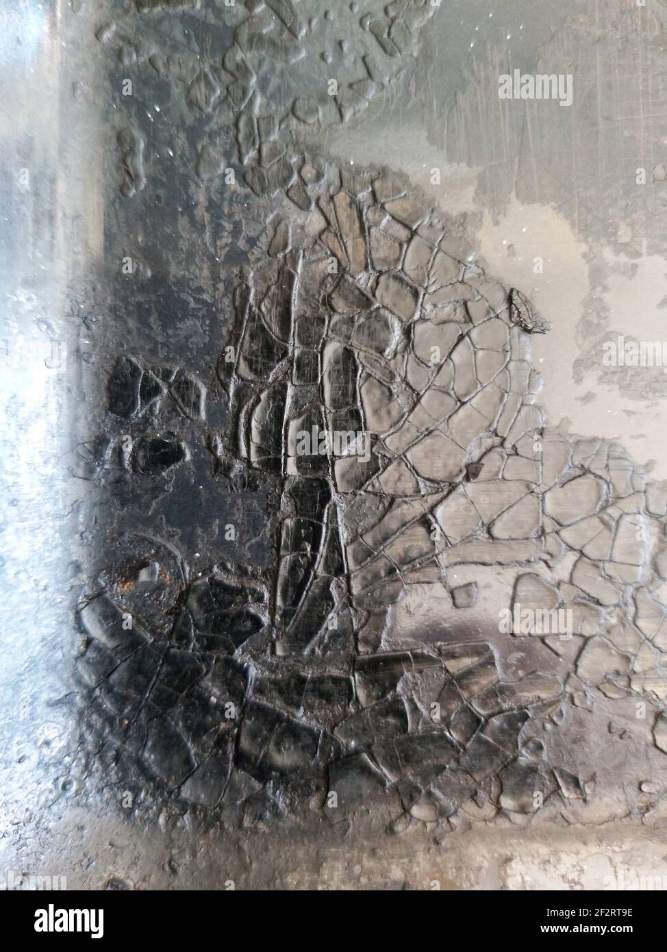 Cracks in the screen spider webbing out Stock Photo - Alamy