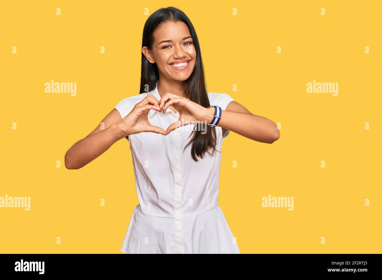 Beautiful hispanic woman wearing casual clothes smiling in love showing ...