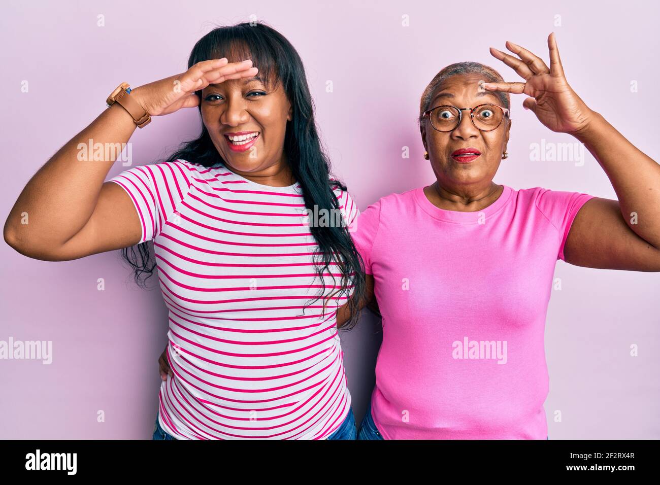 Hispanic family of mother and daughter hugging together with love ...