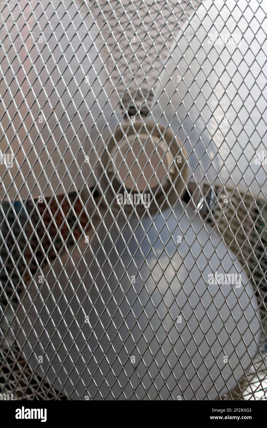 Ventilator fan - plastic blades behind plasti cmesh Stock Photo - Alamy