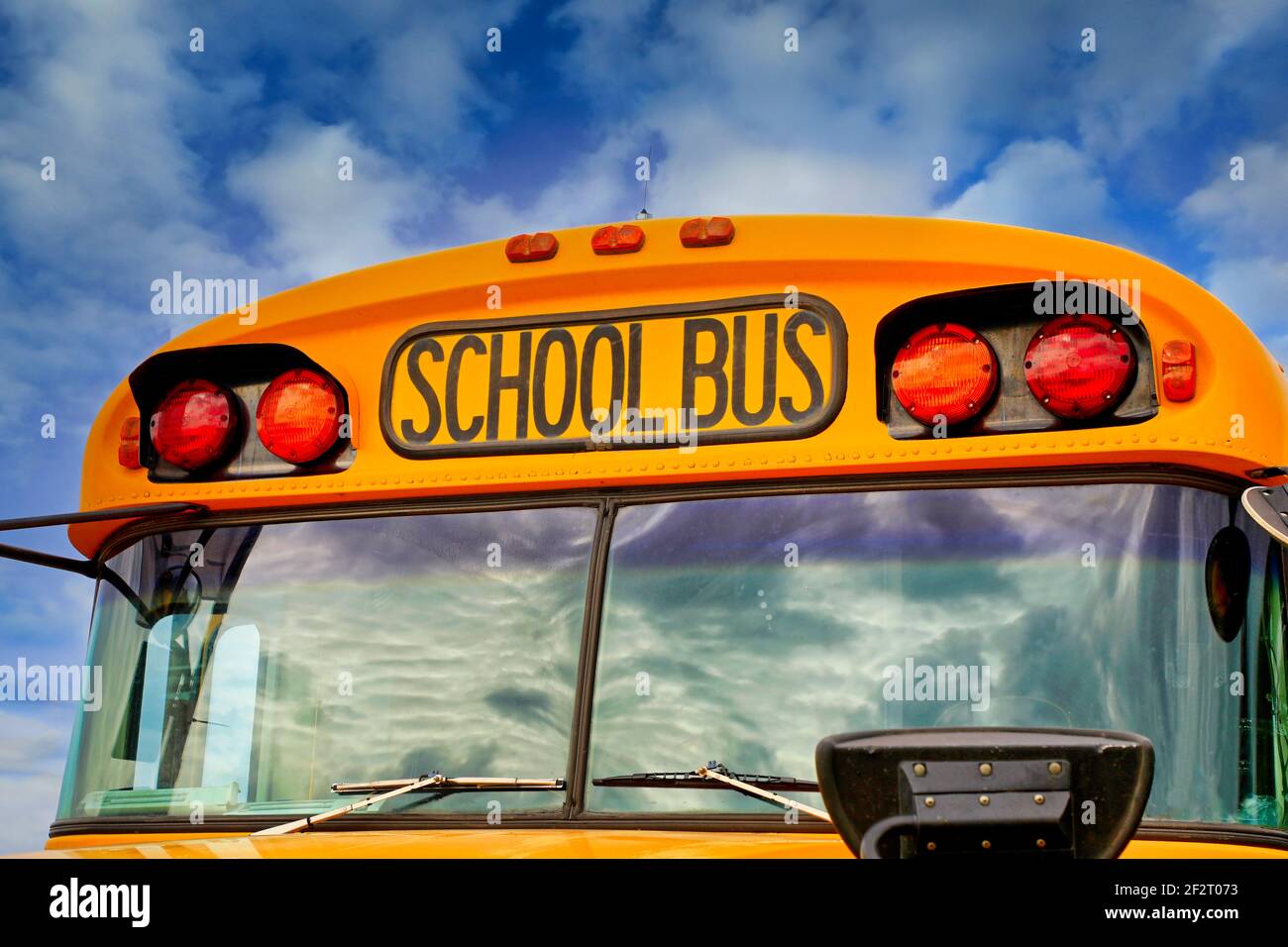 Classic American yellow School Bus, detail against sky seen on Power ...