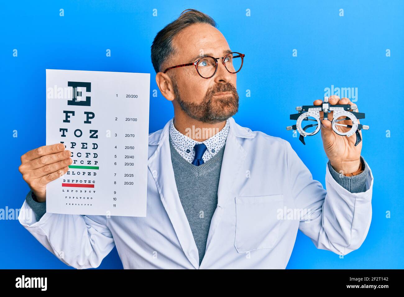 Man staring at eye chart hi-res stock photography and images - Alamy