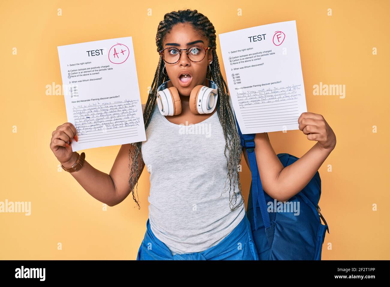 Young african american woman with braids showing failed and passed exam ...