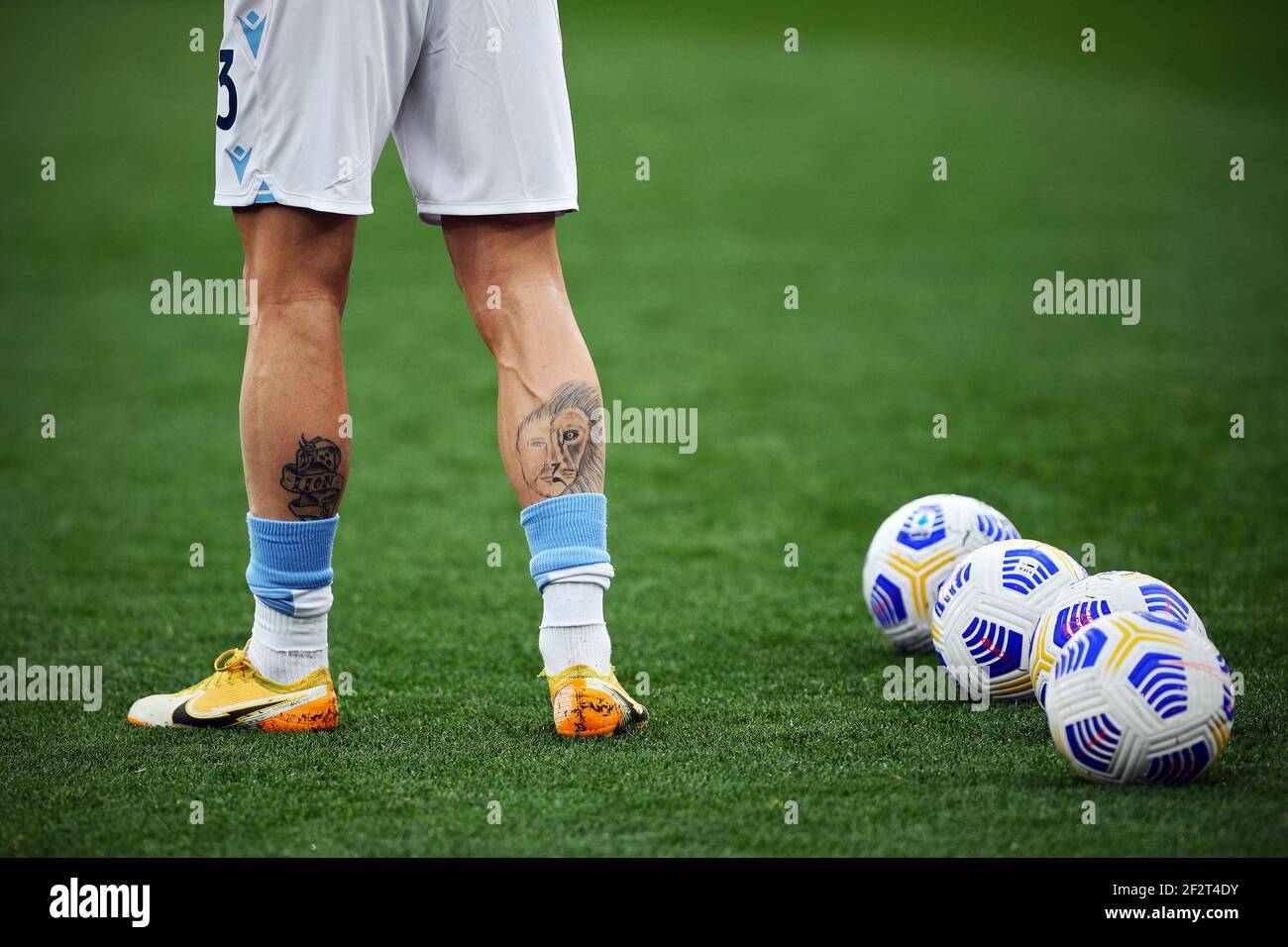 Francesco Acerbi of Lazio shows his lion tattoo on his legs during the ...