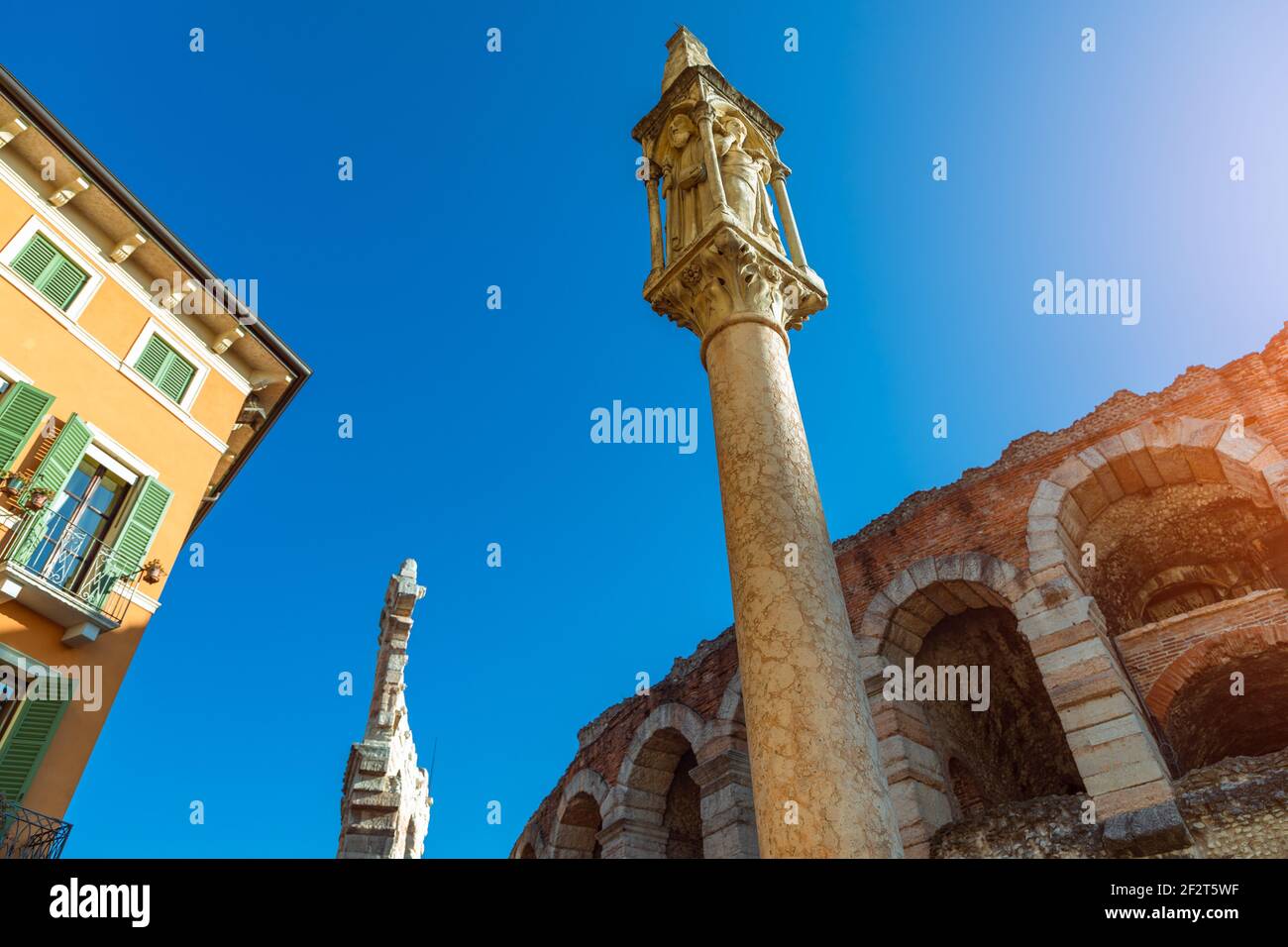 Verona city, Italiy. Part of the wall with the arches of the Arena in ...