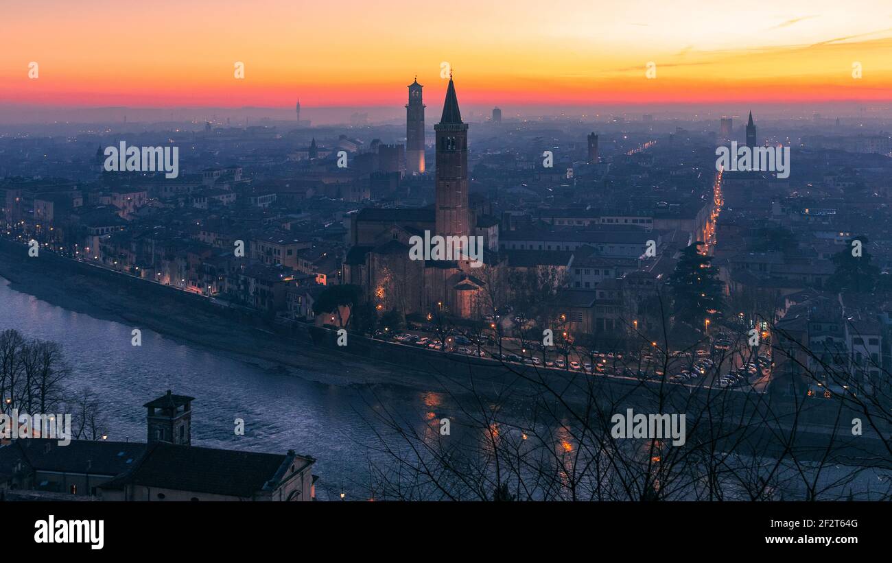 Beautiful panoramic sunset view of old town of Verona, Torre Lamberti ...