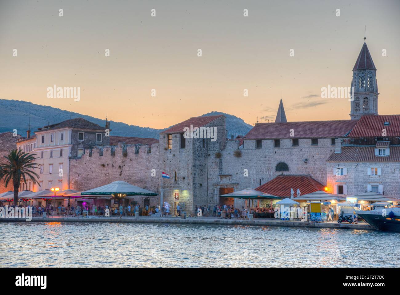 Sunset view of seaside of Croatian town Trogir Stock Photo - Alamy