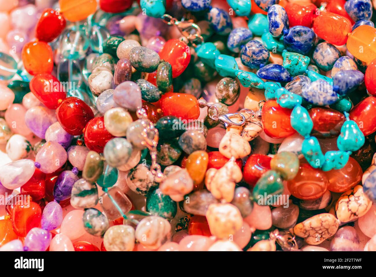 Beautiful background with plenty of colorful stone beads. Collection of ...