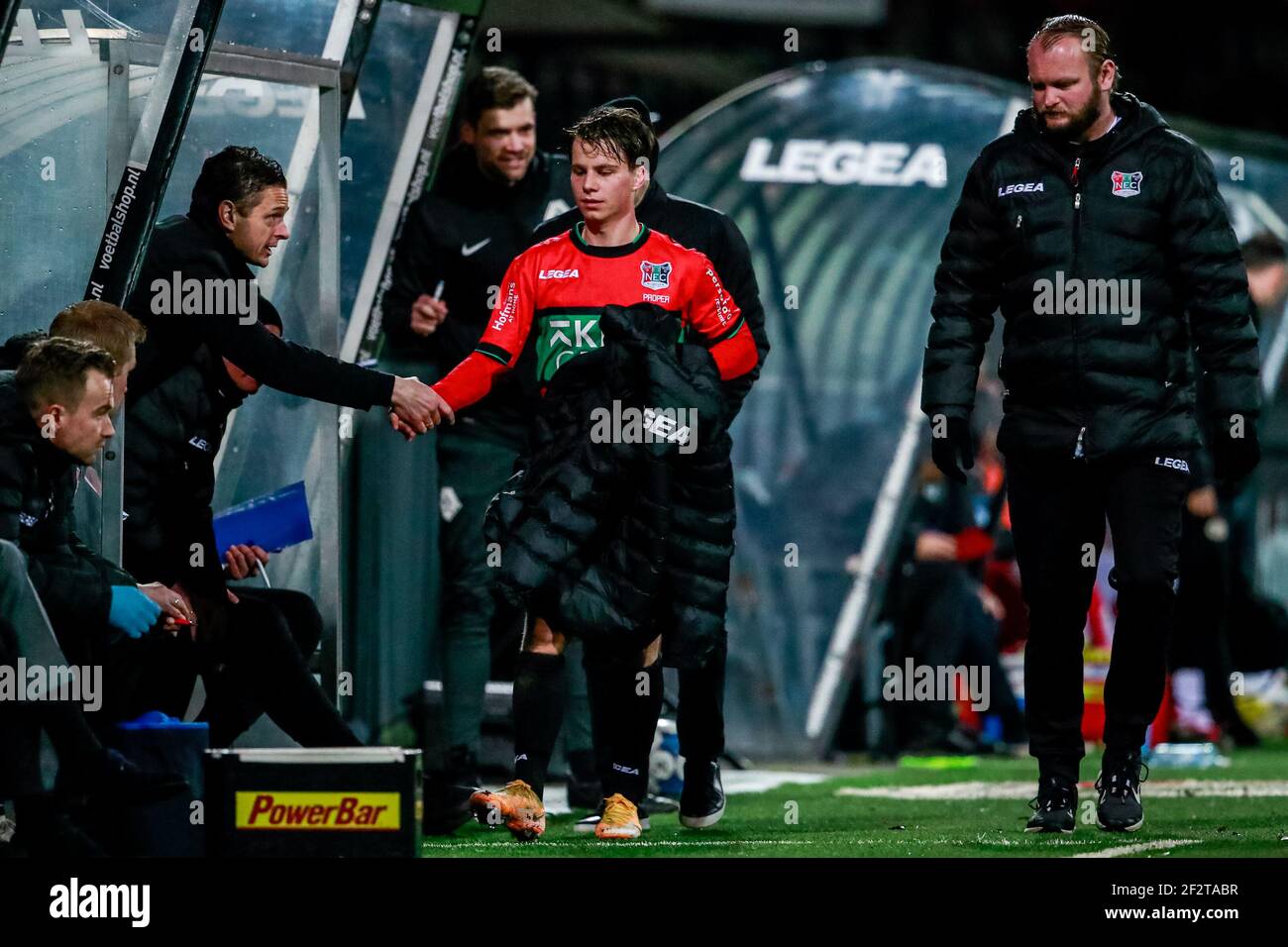 NIJMEGEN, NETHERLANDS - MARCH 12: Head Coach Rogier Meijer of NEC, Dirk ...