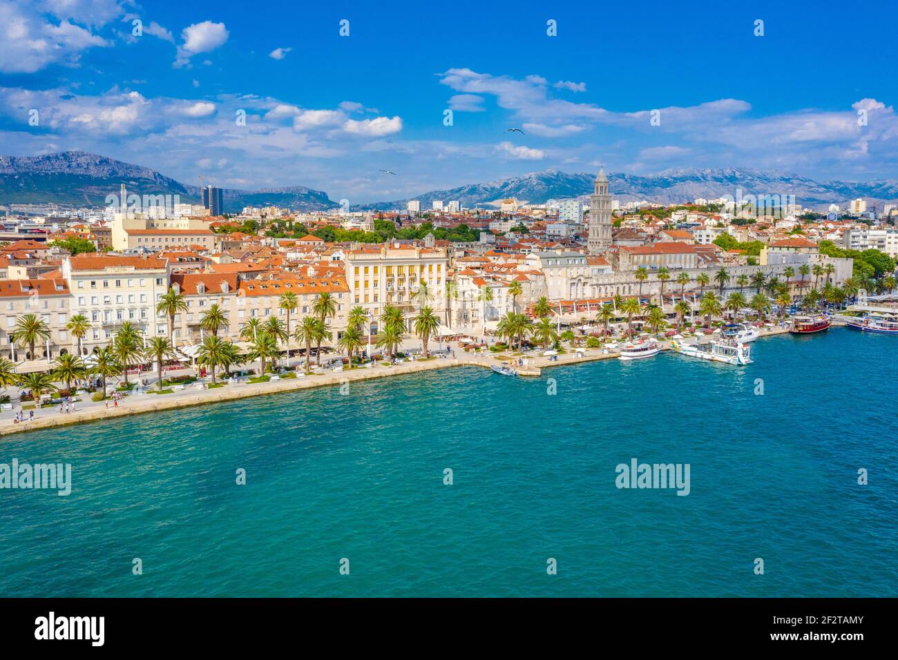 Aerial view of cityscape of Croatian city Split behind Riva promenade ...