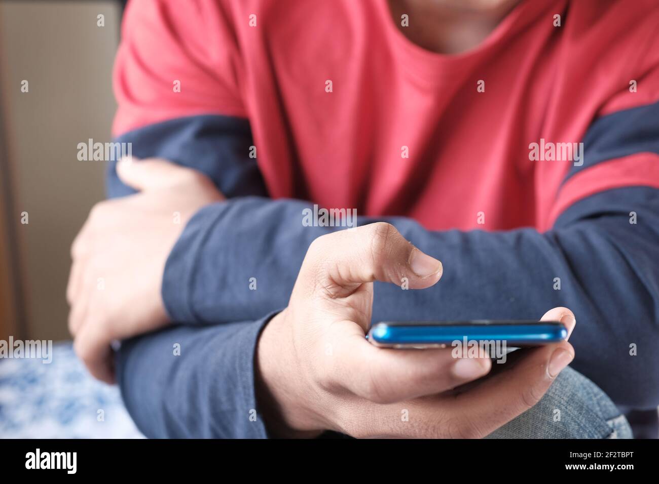 Close up of young man hand using smart phone Stock Photo - Alamy