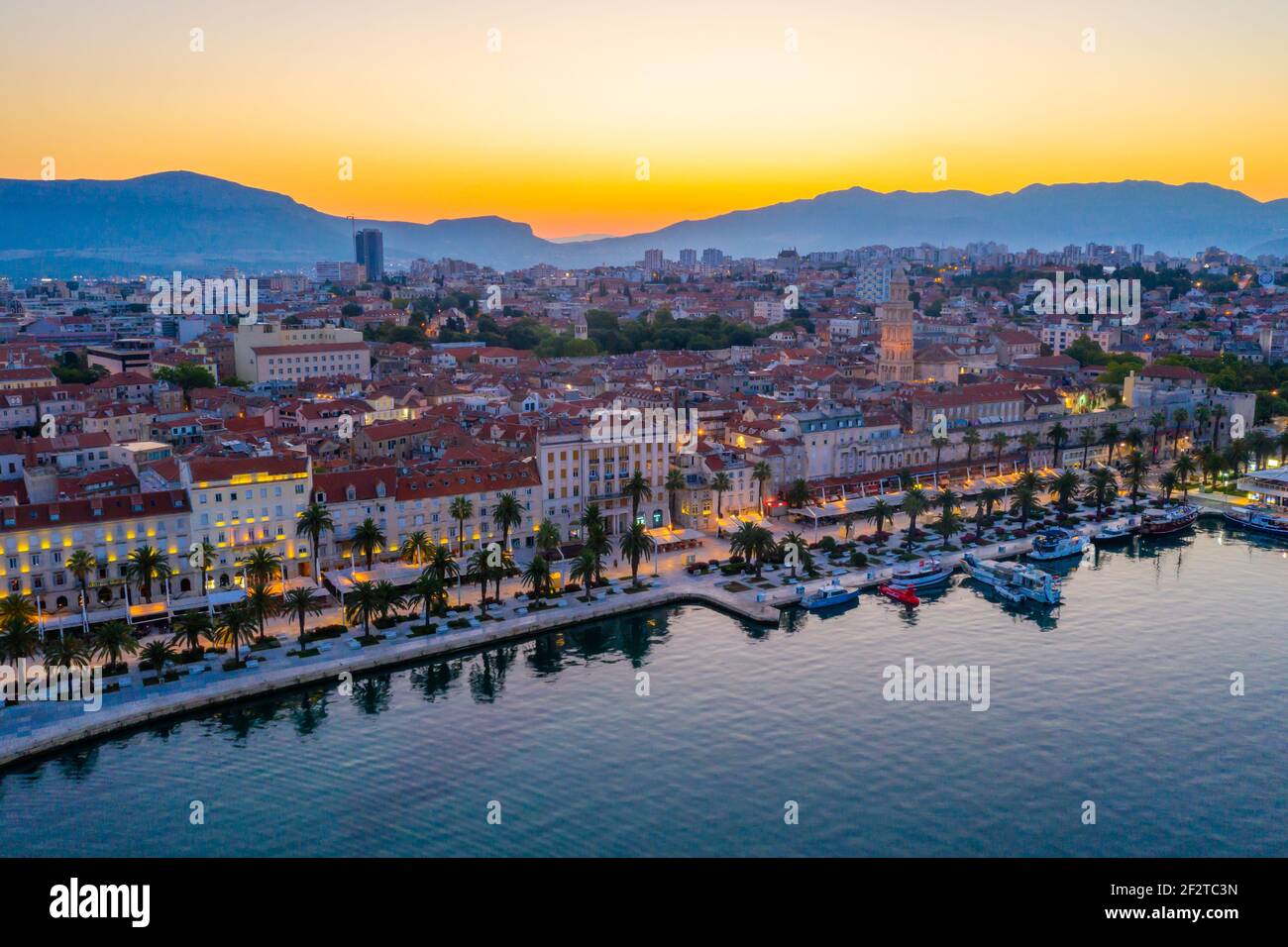 Sunrise view of cityscape of Croatian city Split behind Riva promenade ...