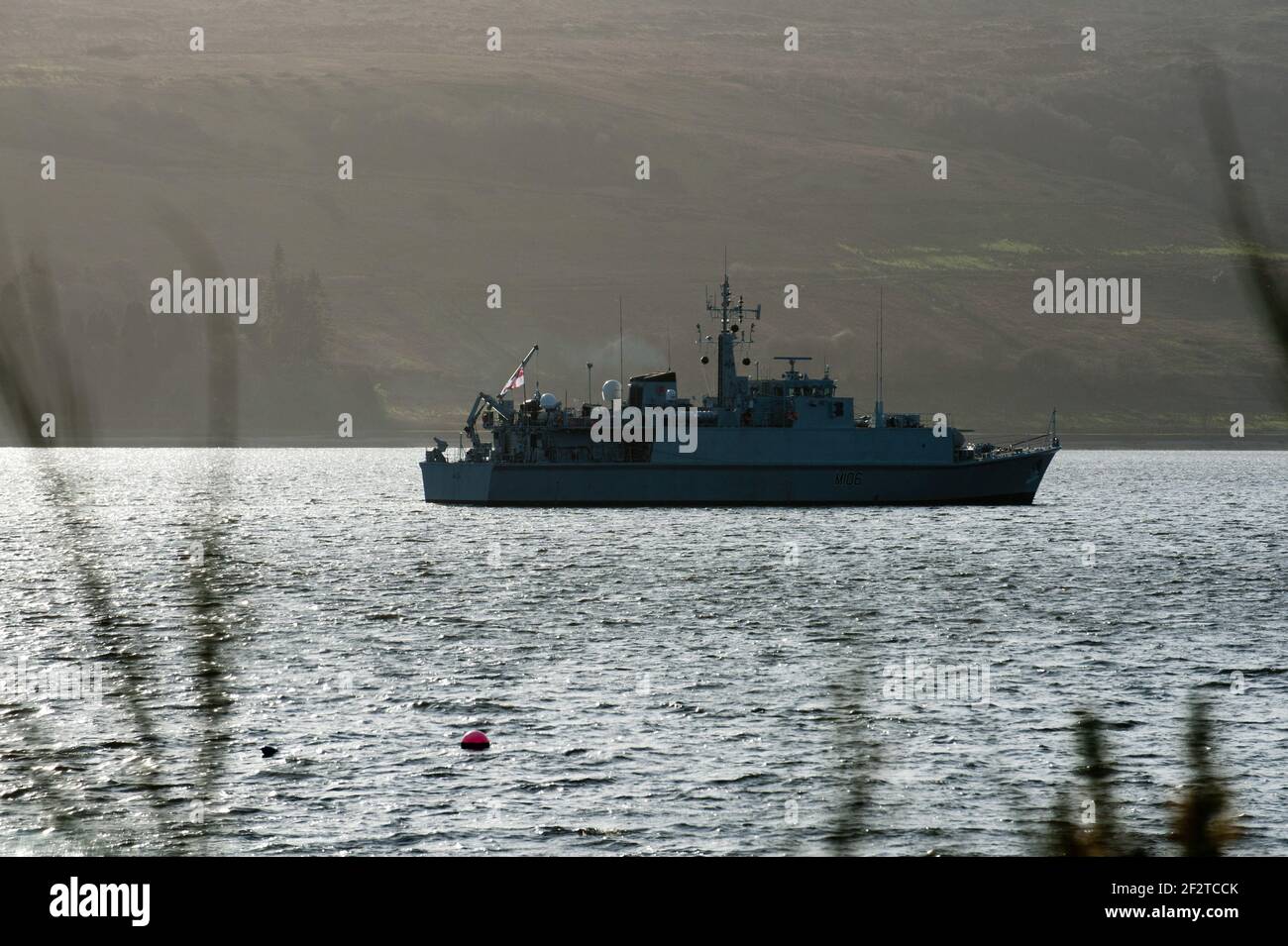 A Royal Navy Sandown class Mine Counter Measures vessel exercising mine ...