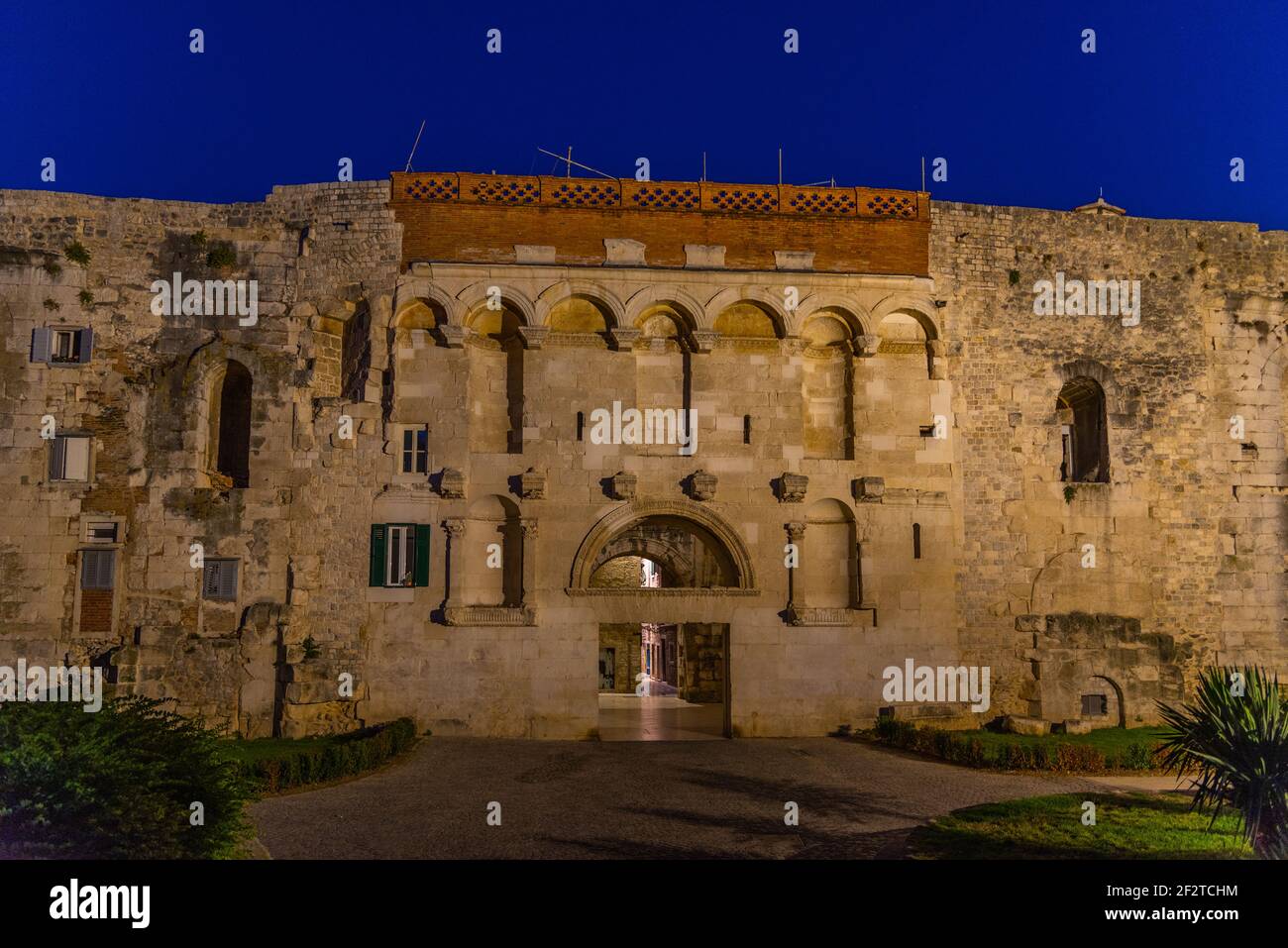 Night view of the golden gate of Diocletian palace in Split, Croatia ...