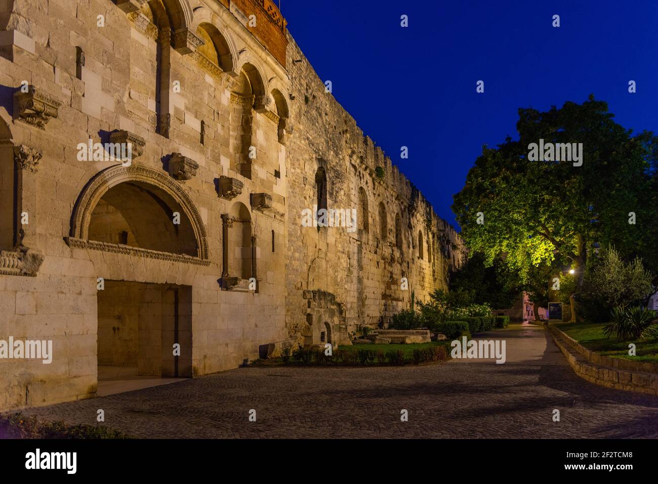 Night view of the golden gate of Diocletian palace in Split, Croatia ...