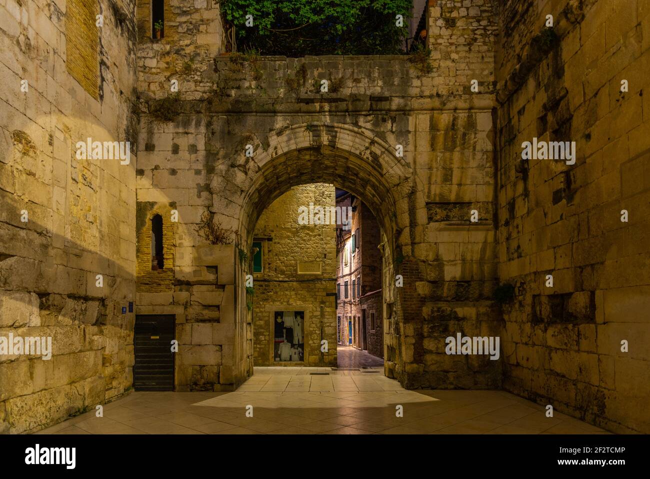 Night view of the golden gate of Diocletian palace in Split, Croatia ...