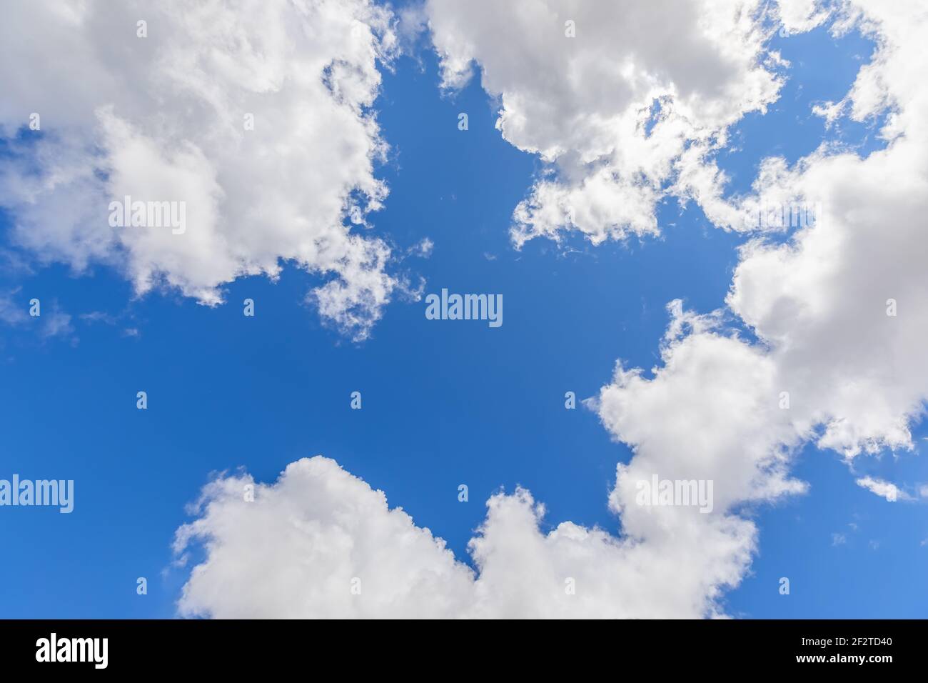 Clear blue sky with cumulus clouds (natural background Stock Photo - Alamy