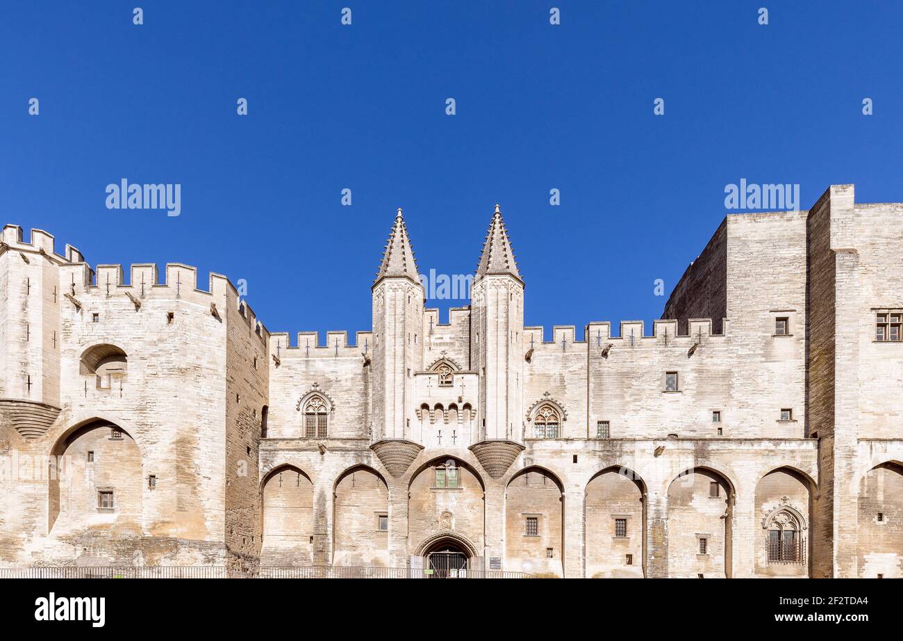View of the castle facade of Palace of the Popes in the city of Avignon ...