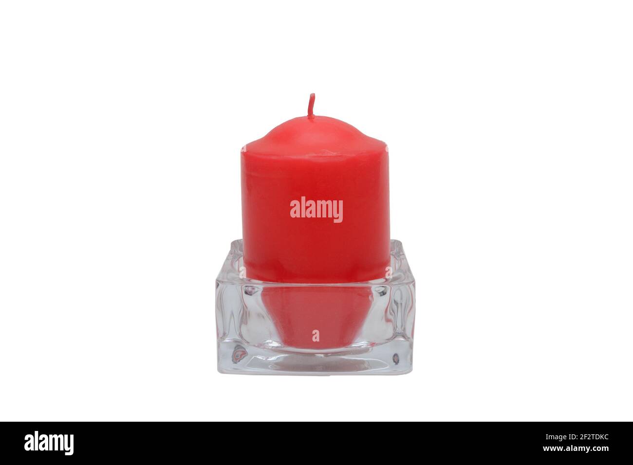Red candle in glass stand. Isolated on white background Stock Photo - Alamy